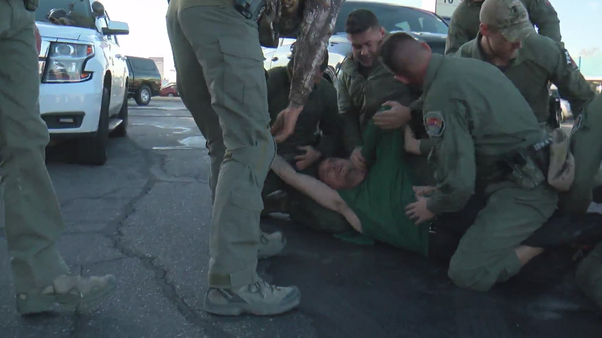 CAUGHT ON CAMERA: burglary suspect tries running from APD SWAT standoff ...