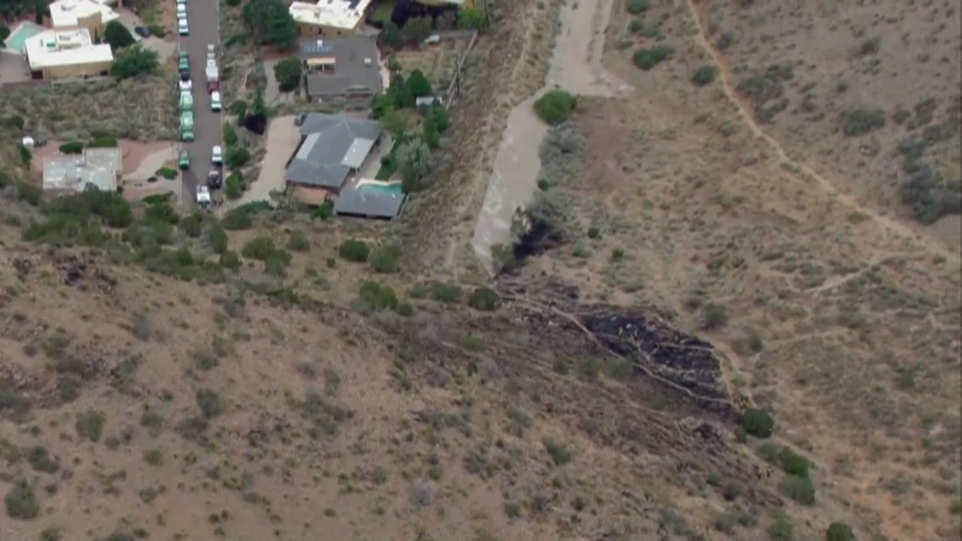 Sky News 13 flies over the aftermath of 5-acre brush fire in the ...